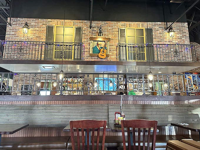 The New Orleans-inspired interior with faux balconies and brick walls brings French Quarter vibes without the humidity or beads.