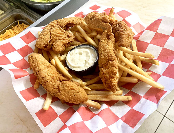 These aren't just chicken strips – they're golden-crusted perfection that would make Colonel Sanders rethink his entire life strategy.