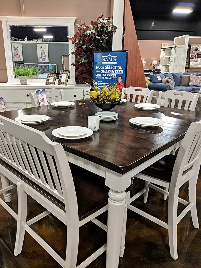 This farmhouse dining table isn't just furniture—it's the backdrop for future family arguments, holiday meals, and those rare moments when everyone actually sits together.