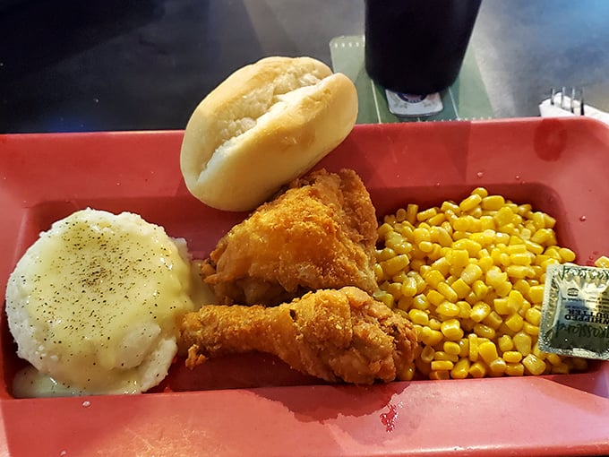 Monday's broasted chicken dinner comes with all the fixings—mashed potatoes, corn, and a roll that's begging to sop up every last drop of gravy.