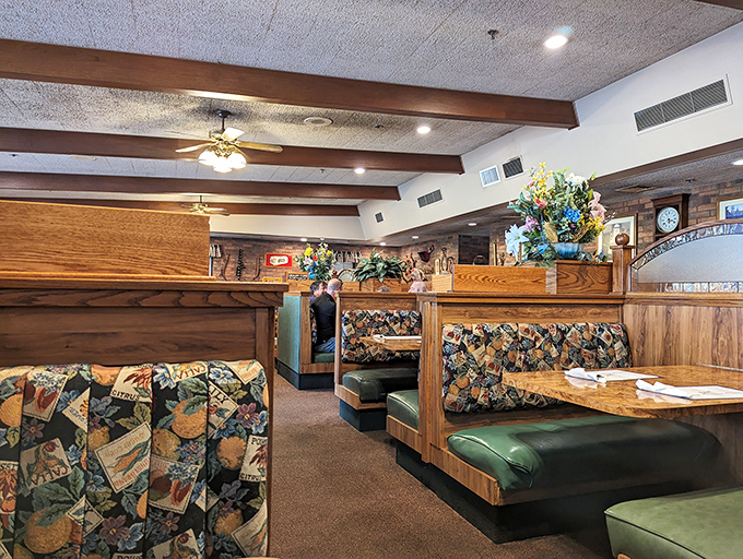 The dining room where pie memories are made. Those wooden dividers have heard more "mmms" than a meditation retreat.