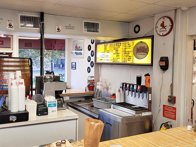 The narrow kitchen space forces a ballet-like precision from the staff, who navigate the tight quarters with the grace of dancers who've memorized every step.