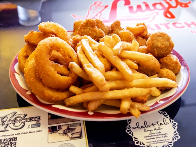 A platter that answers the eternal question: "Why choose one fried delight when you can have three?" Plus fries for good measure!