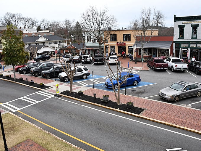 Dahlonega's hillside view showcases church steeples and historic buildings – a postcard-perfect scene that doesn't require a postcard-sized budget. 