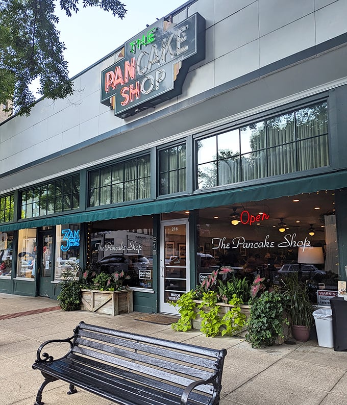 The Pancake Shop: That elegant green storefront with flower boxes is like the sophisticated aunt of breakfast joints—classy but still fun.