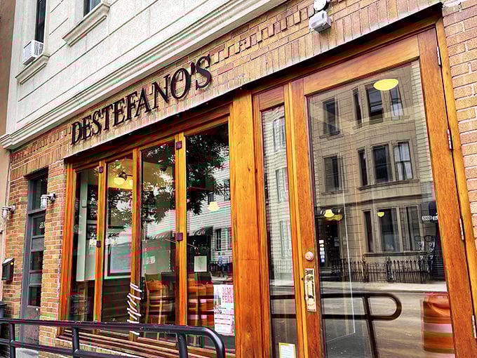 Those wooden doors at DeStefano's might as well be portals to a time when steakhouses were temples and servers were priests.