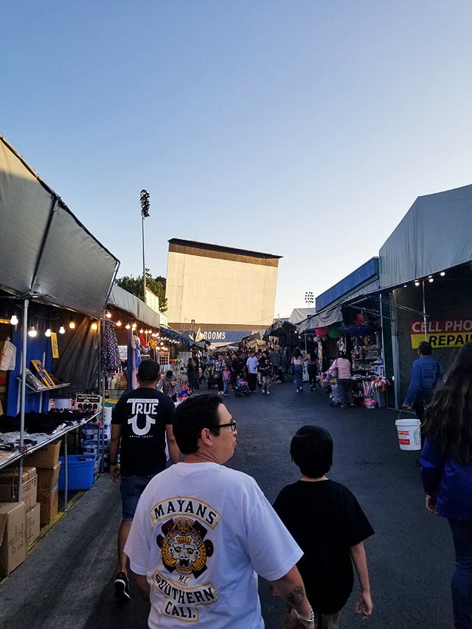 As evening approaches at Santa Fe Springs, the market transforms. Night shopping has a magical quality—like a bazaar from another time.