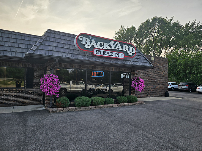 Hanging flower baskets and tidy landscaping give this suburban gem a touch of homey charm that perfectly complements its serious approach to steak.