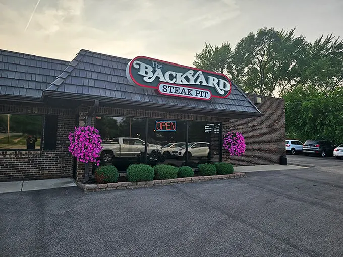 Hanging flower baskets and tidy landscaping give this suburban gem a touch of homey charm that perfectly complements its serious approach to steak.