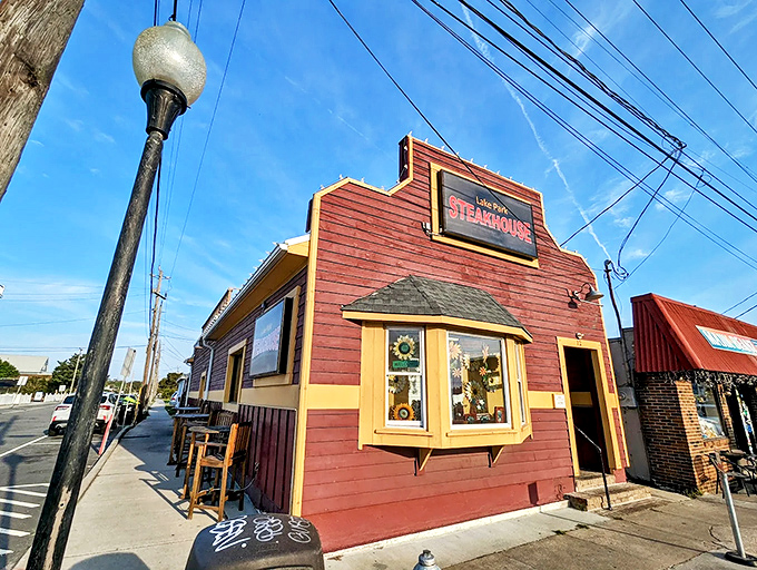The unassuming red exterior with yellow trim might fool you—like finding out your quiet neighbor used to tour with The Rolling Stones.