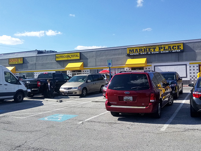 The unassuming exterior of Washington Boulevard Marketplace hides a treasure trove within. Like finding a portal to retail wonderland behind a humble storefront.