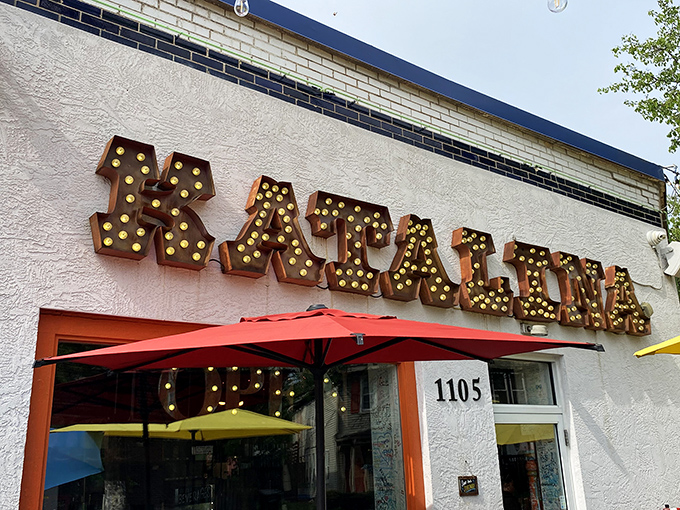 The marquee-style "KATALINA'S" sign glows with promise, like a Broadway show where breakfast is the star and your taste buds get front-row seats.