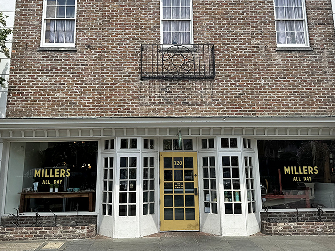 A glimpse of paradise through paned windows—Millers All Day's inviting exterior promises breakfast bliss behind that cheerful yellow door.