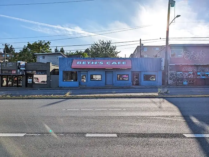 The unmistakable bright blue exterior with cherry-red awning says it all: culinary treasures don't always hide in fancy packages.