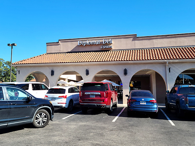 The unassuming exterior of Diplomat Deli in Vestavia Hills hides culinary treasures within. That terracotta roof isn't compensating for anything—the sandwiches speak for themselves.