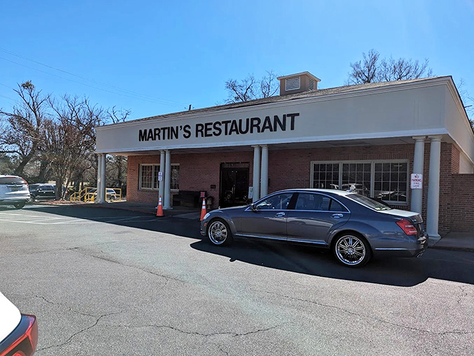 Martin's Restaurant stands proudly on Carter Hill Road, its unassuming brick exterior hiding culinary treasures that have drawn devoted fans for decades.