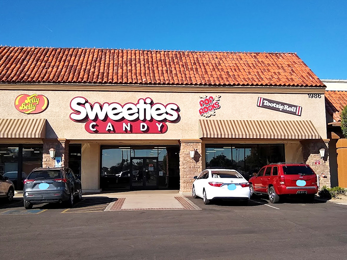 The smiley face logo says it all—this isn't just a candy store, it's therapy with a sugar rush guarantee.