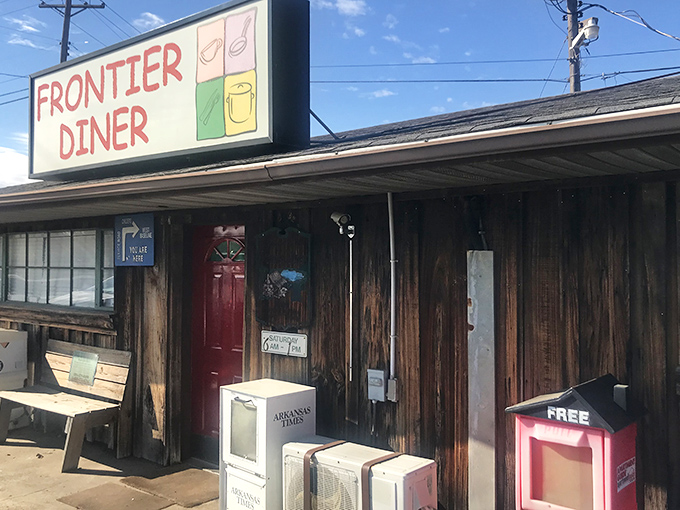 No architectural awards needed here—just a humble wooden exterior that promises more flavor per square foot than any fancy establishment in town.