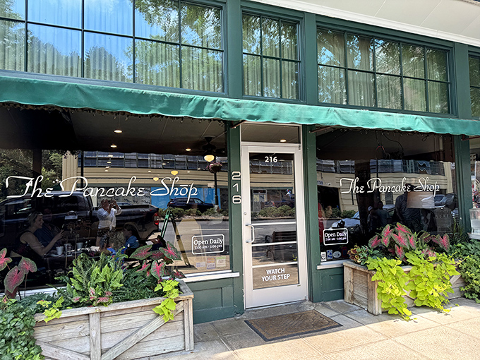 The iconic green storefront of The Pancake Shop stands as a beacon of breakfast hope on Central Avenue in Hot Springs. 