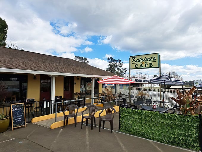 The sunny yellow exterior of Katrina's Café welcomes you like an old friend, complete with colorful umbrellas that practically whisper, "Come sit awhile."