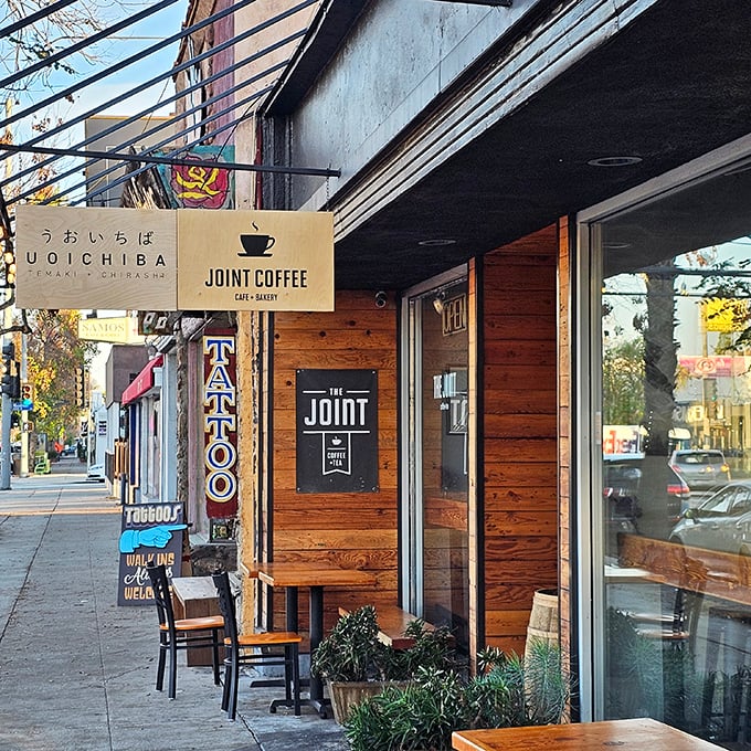 The wooden façade of The Joint feels like a secret handshake – understated, welcoming, and promising something special behind those doors.