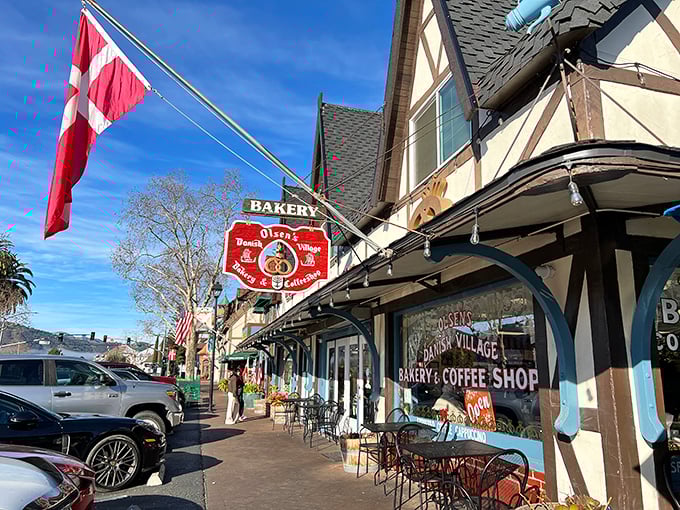 The storybook façade of Olsen's Danish Village Bakery beckons like a portal to Copenhagen, complete with thatched roof and that unmistakable aroma of butter and sugar.