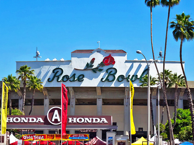 The iconic Rose Bowl sign welcomes treasure hunters to what might be the holy grail of flea markets. Those palm trees aren't just for show—they're witnesses to decades of haggling.
