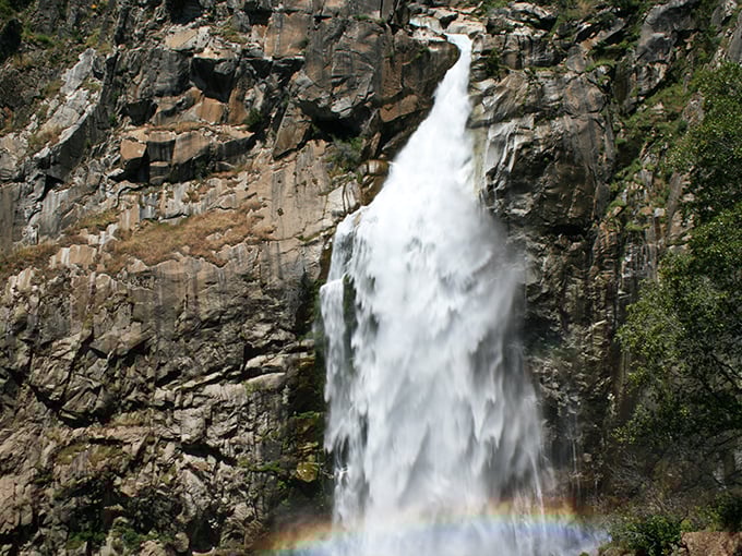 Feather Falls peeks through the forest canopy like nature's own game of hide-and-seek, teasing visitors with glimpses of its majestic cascade.