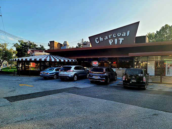 That iconic angular roof isn't just architectural flair—it's a beacon calling hungry Delawareans home like a mid-century modern lighthouse for cheeseburger enthusiasts.