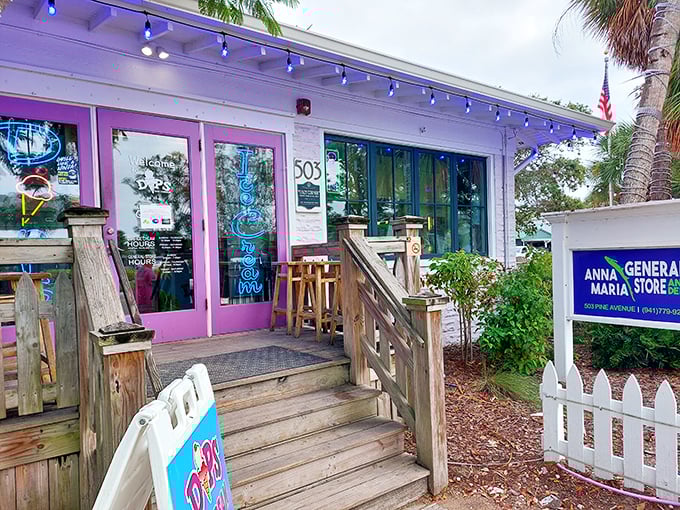 Those pink doors aren't just an entrance to a store – they're a portal to sandwich paradise. The charming exterior promises island treasures within.