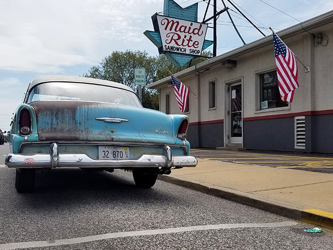 The iconic Maid-Rite sign beckons hungry travelers like a midwestern lighthouse, promising comfort food that's stood the test of time.