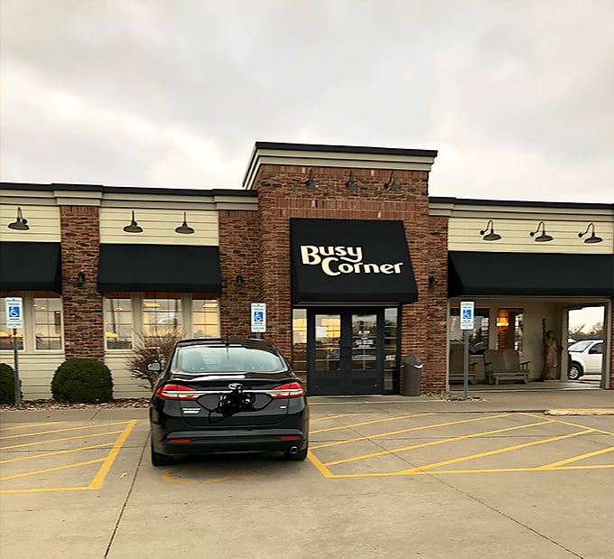 The unassuming brick exterior of Busy Corner belies the culinary treasures within. Like finding a Michelin star in your neighbor's garage.