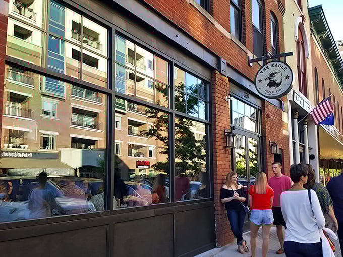 The Eagle's brick façade on Mass Ave beckons like an old friend, promising comfort food that'll make you forget your troubles—and possibly your diet.