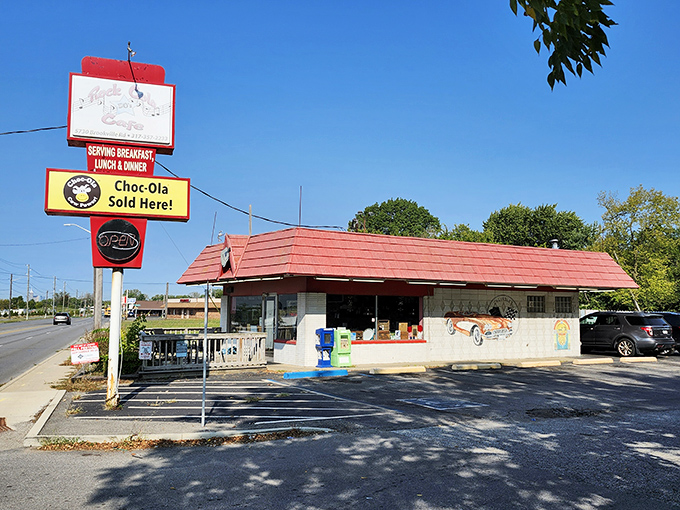 The red-roofed time machine on Brookville Road beckons with its "Choc-Ola Sold Here!" sign – a promise of simpler, sweeter times ahead.