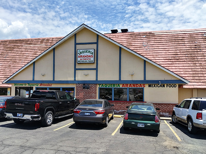 The A-frame architecture isn't just charming—it's a beacon for burrito pilgrims. This unassuming exterior houses Kansas City's most authentic Mexican flavors.