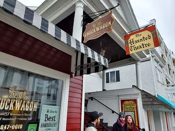 The little red diner that could! The Chuckwagon's modest exterior with its classic striped awning promises big flavors inside this Mackinac Island gem.