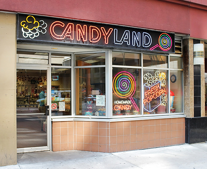 The iconic Candyland storefront beckons with its rainbow-hued sign – a portal to childhood that's been tempting Minneapolis sweet tooths since 1932.