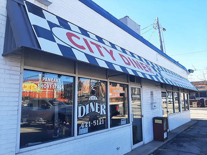 The classic black-and-white checkered awning isn't trying to be retro—it just is. City Diner stands as a beacon of breakfast hope in Kansas City.