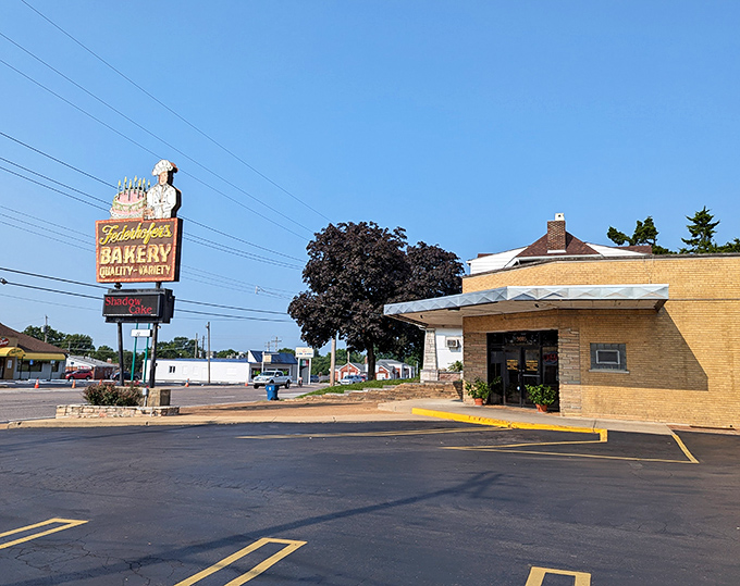 That vintage sign with the chef holding a birthday cake isn't just advertising – it's a St. Louis landmark promising sweet salvation ahead.