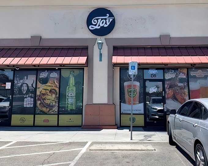 The unassuming storefront of Joy Burgers proves once again that culinary treasures often hide in plain sight, away from the neon-drenched Strip.