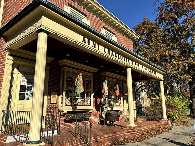The brick facade of Aunt Charlotte's stands like a sweet sentinel of simpler times, promising confectionery magic behind those welcoming doors.