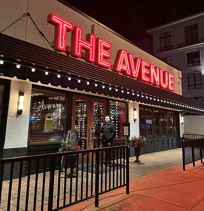 That iconic red neon sign isn't just announcing dinner—it's promising a culinary love affair with properly cooked beef in Columbus. 
