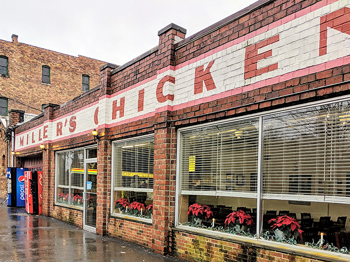 The iconic brick façade of Miller's Chicken stands as Athens' monument to comfort food, complete with seasonal poinsettias that say "we care about the details."