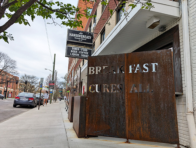 The bright red door and yellow windows of HangOverEasy aren't subtle—they're practically shouting "Wake up and get in here!" A colorful beacon for hungry Columbus souls.