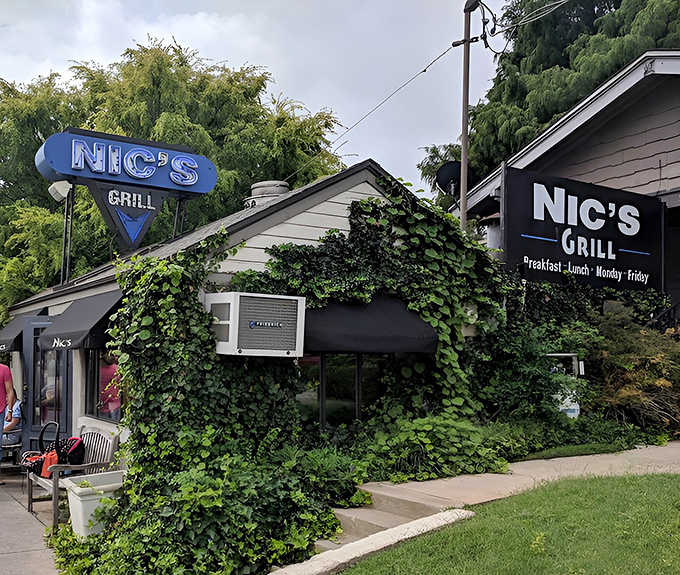 The humble exterior of Nic's Grill belies the culinary treasures within. This unassuming shack houses Oklahoma City's burger paradise.