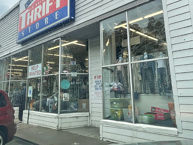 The unassuming white brick exterior hides a treasure trove within—like finding a speakeasy, but for vintage bargains instead of cocktails.