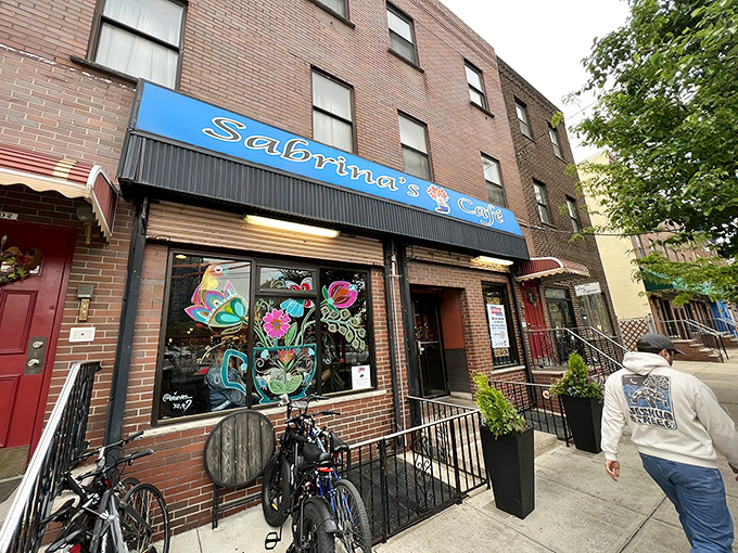 The bright blue awning of Sabrina's Café stands out like a breakfast beacon, promising morning delights to Philadelphia's hungry masses.