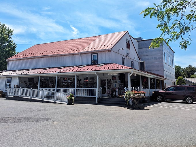 The classic white clapboard exterior with its distinctive red roof promises old-fashioned delights inside. Pennsylvania's answer to comfort food heaven awaits.