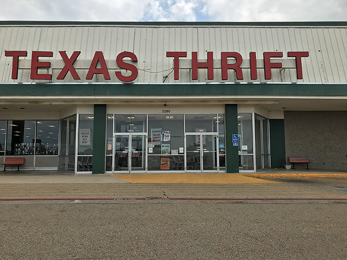 The red letters beckon like a siren song to bargain hunters. This unassuming storefront houses treasures that would make antique roadshow appraisers sweat.