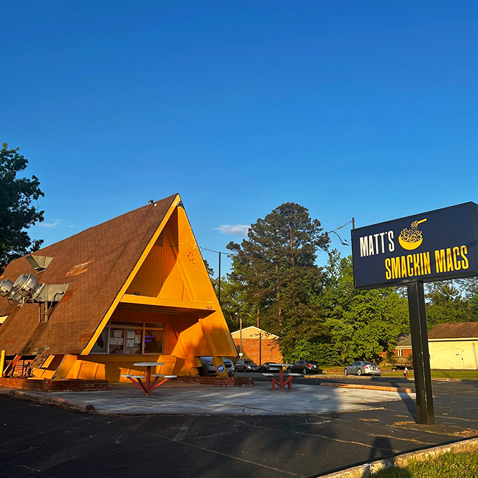 The bright orange A-frame building stands like a cheese-colored beacon of hope for comfort food enthusiasts across Newport News.